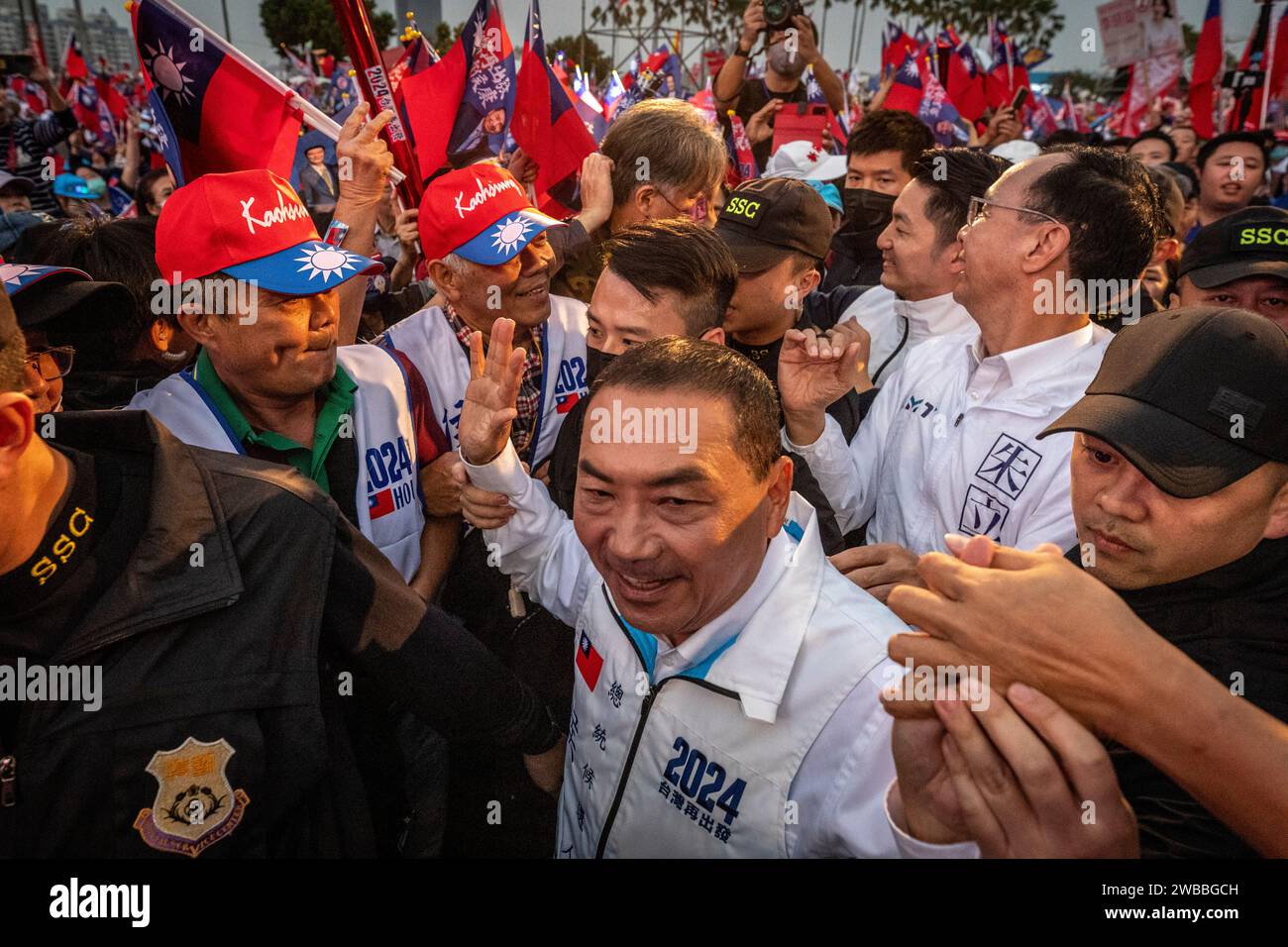 KMT Presidential Candidate Hou Yu-ih greets supporters at the election ...