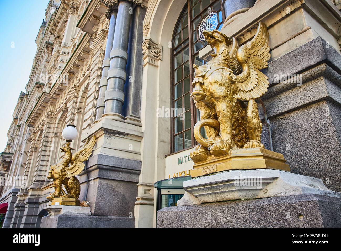 Golden Griffin Sculpture on Historic Building Facade, Street View ...