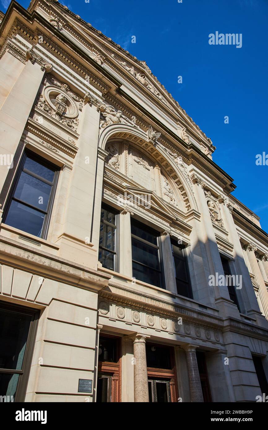 Neoclassical Courthouse Facade with Corinthian Columns Against Blue Sky ...
