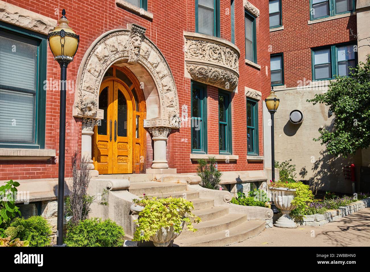Historic Red Brick Building with Yellow Arched Door, Indianapolis Stock ...