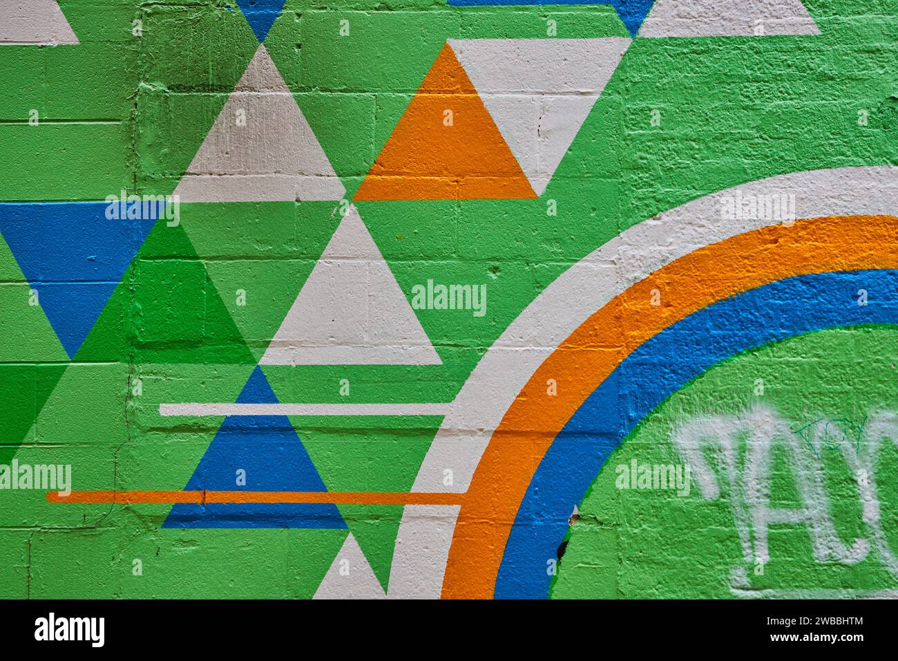Vibrant Geometric Wall Mural in Urban Setting Stock Photo - Alamy