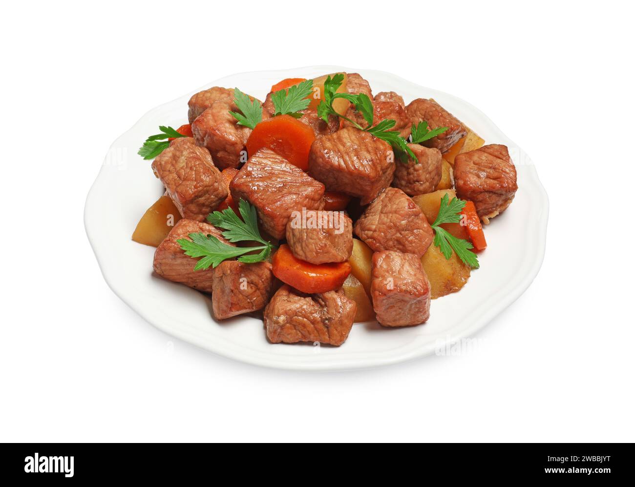 Plate with delicious goulash isolated on white Stock Photo - Alamy
