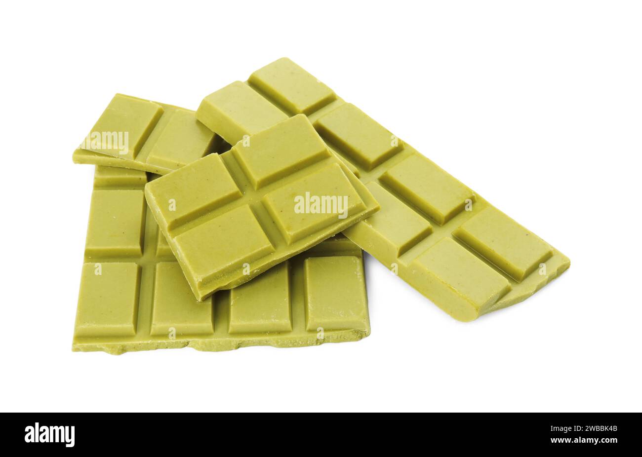 Pieces of tasty matcha chocolate bar isolated on white Stock Photo - Alamy