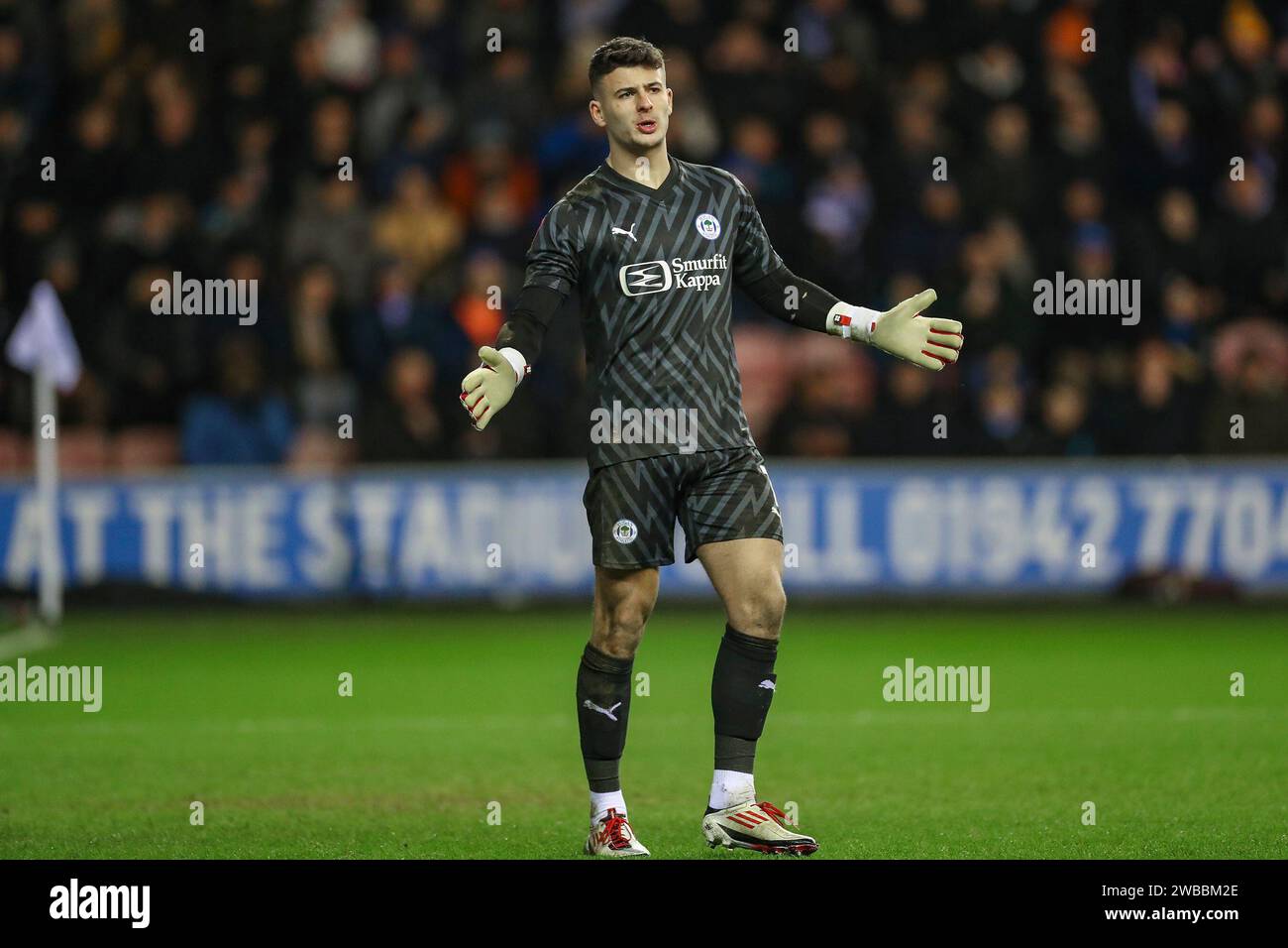 Wigan, UK. 08th Jan, 2024. Wigan Athletic goalkeeper Sam Tickle (1 ...