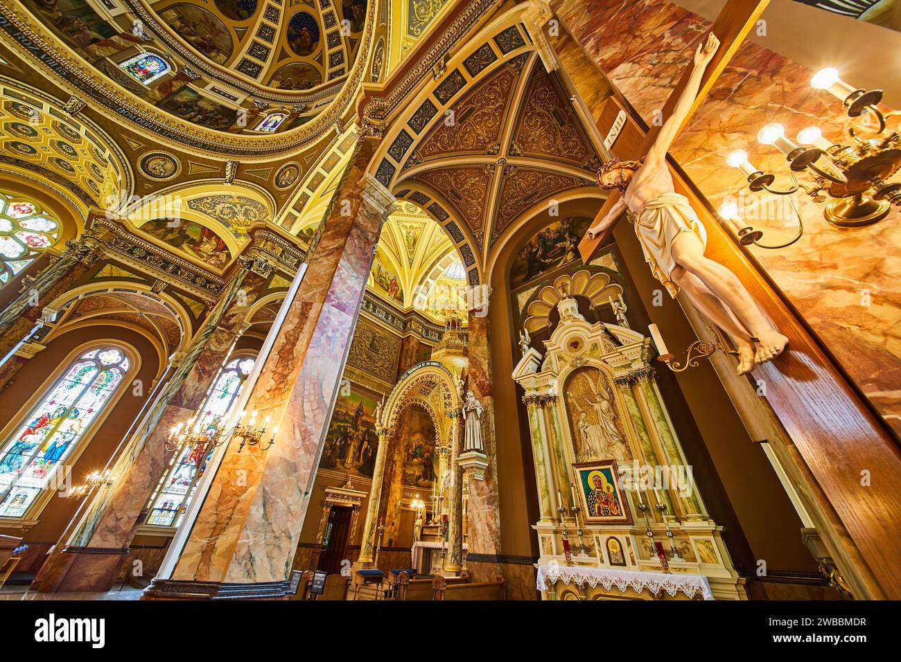 Ornate Church Interior with Crucifix and Stained Glass, Low-Angle View ...