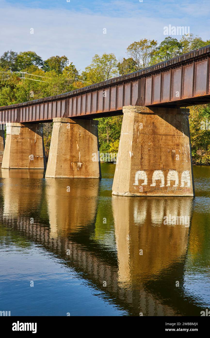 Rustic Railroad Bridge Reflection in Huron River, Michigan Stock Photo ...