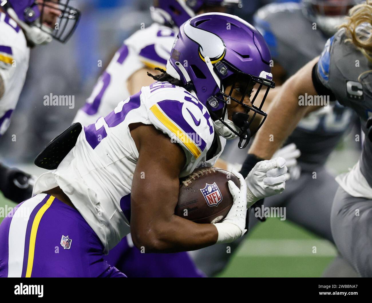 Minnesota Vikings running back Ty Chandler carries the ball against the ...