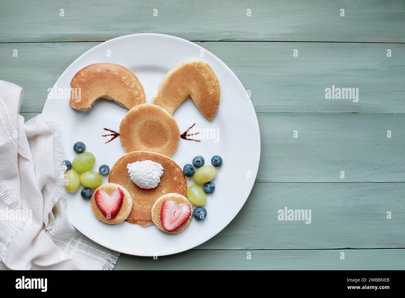 Fun pancake bunny rabbit with fluffy tail hopping away for children ...
