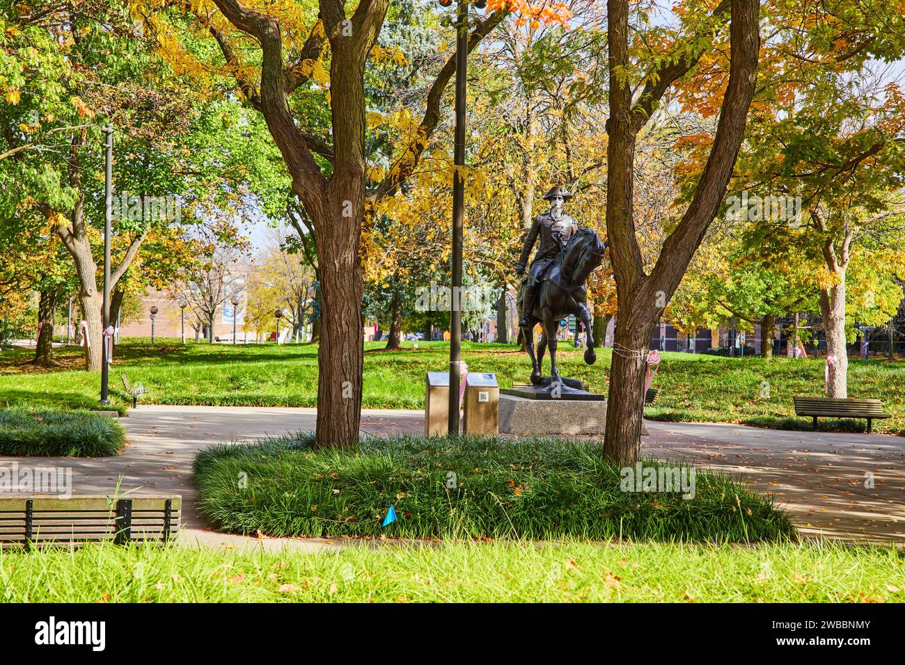 Autumnal Equestrian Statue in Serene Park - Eye Level View Stock Photo ...