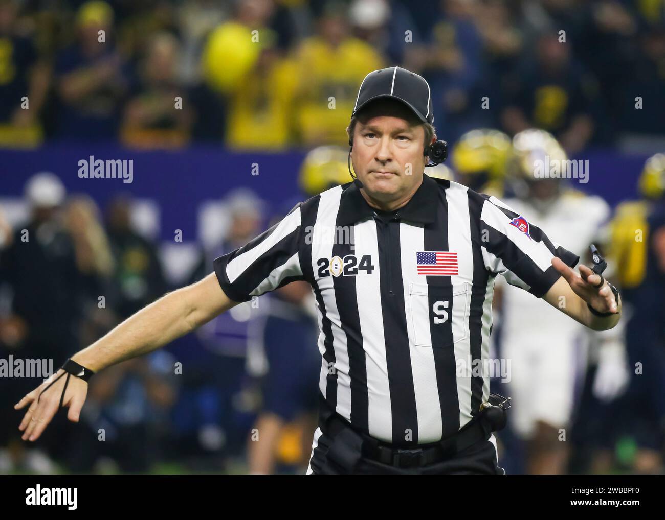 HOUSTON, TX - JANUARY 08: Side judge Michael McCarthy makes a signal ...