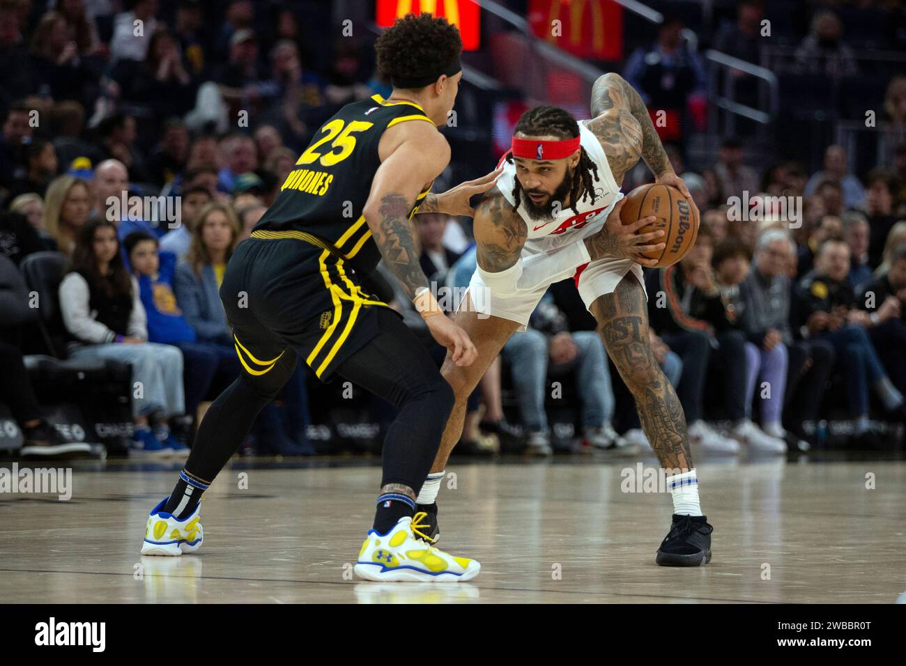 Toronto Raptors guard Gary Trent Jr. (33) looks to drive around Golden ...