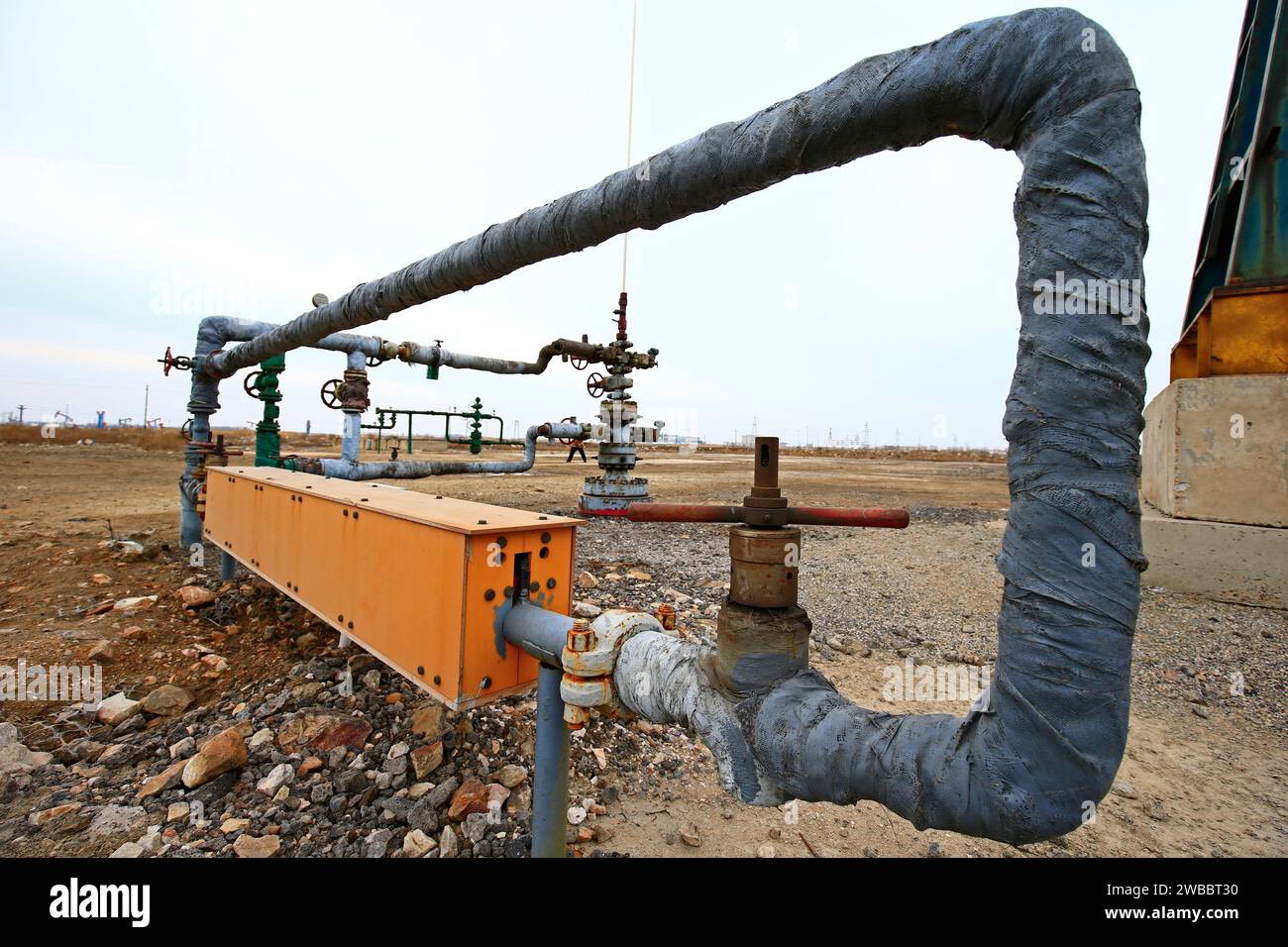 Oil pipes and valves Stock Photo - Alamy