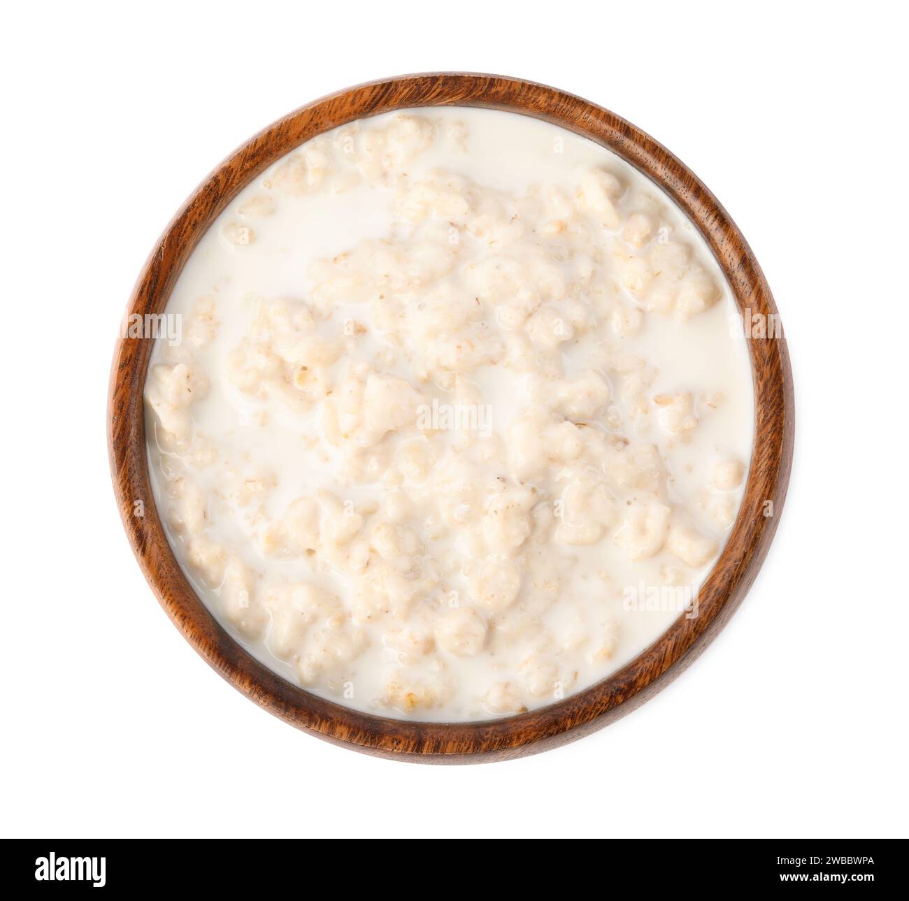 Tasty boiled oatmeal in bowl isolated on white, top view Stock Photo ...
