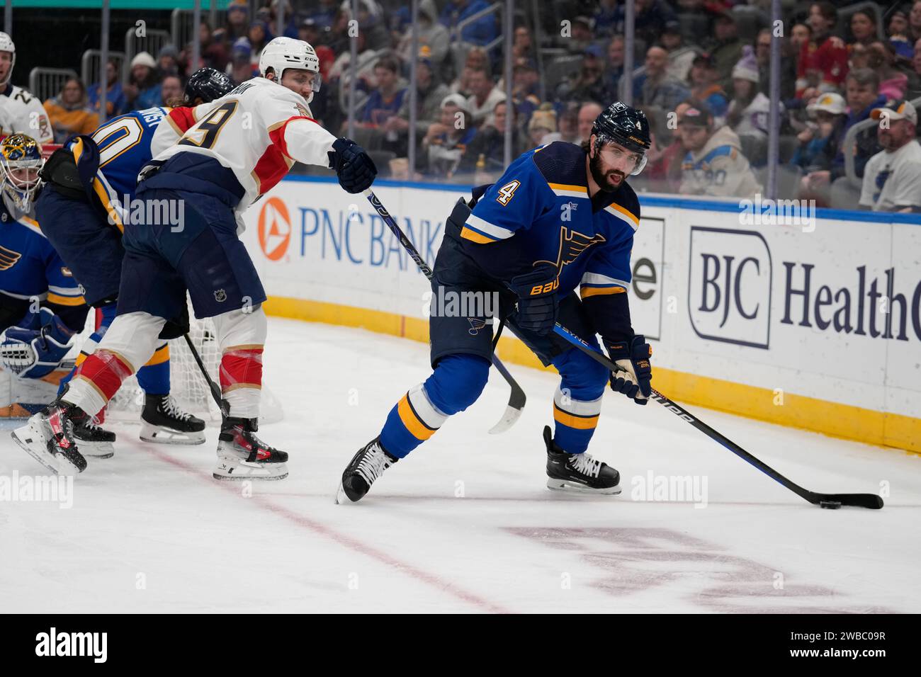 St. Louis Blues' Nick Leddy (4) handles the puck as Florida Panthers ...