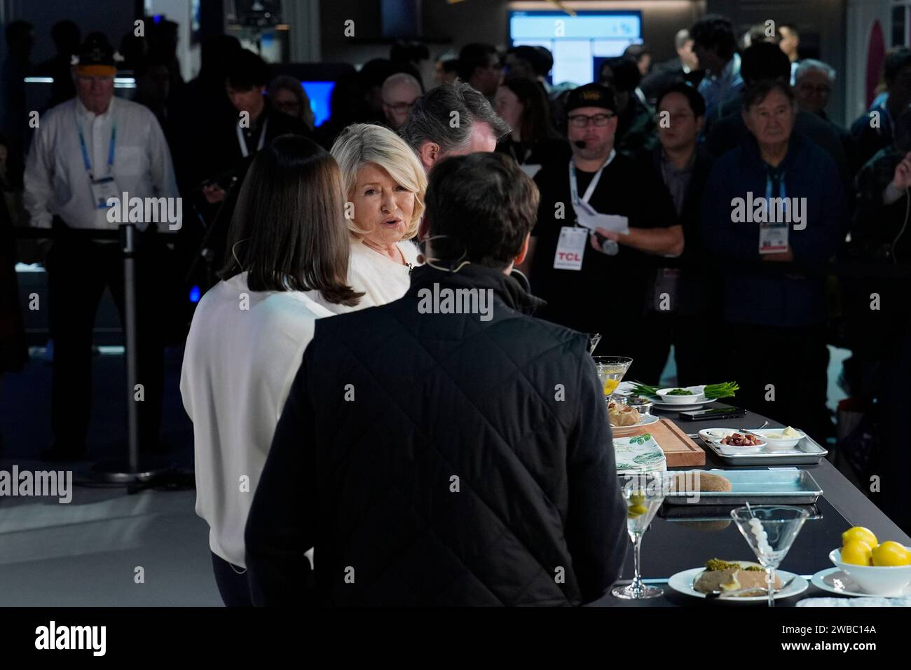 Martha Stewart, center, speaks at the Samsung booth during the CES tech show, Tuesday, Jan. 9 ...