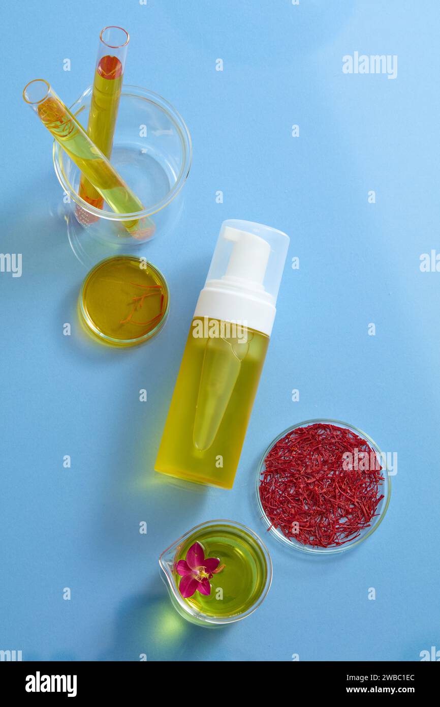 Mockup scene with a pump bottle unbranded displayed on blue background ...