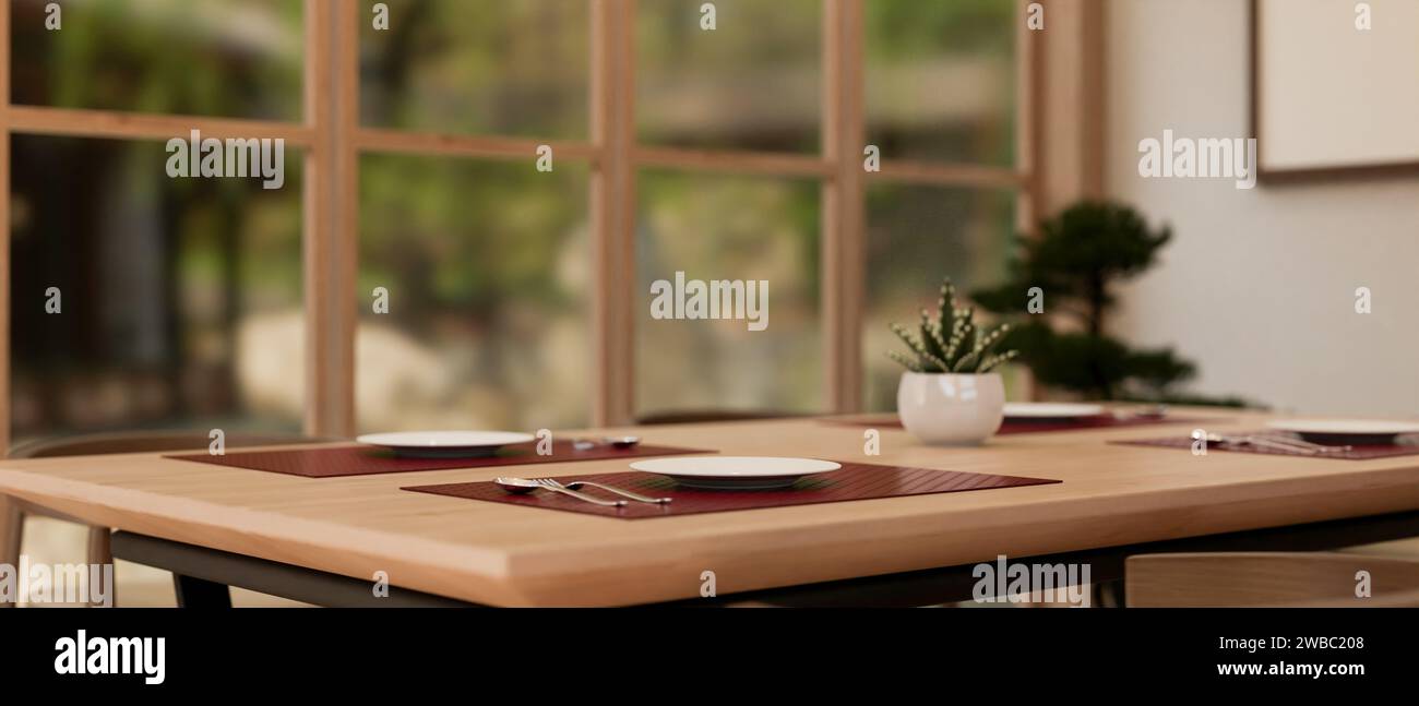 Close-up image of a wooden dining table in a beautiful, cosy dining ...