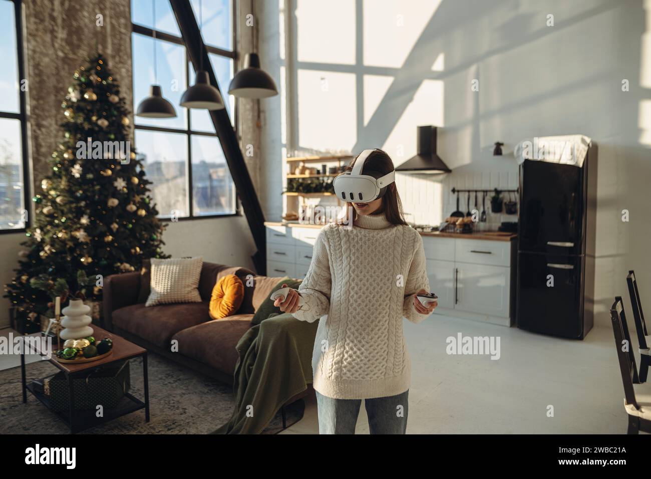 Describing her impressions, a beautiful girl in a VR headset shares her ...