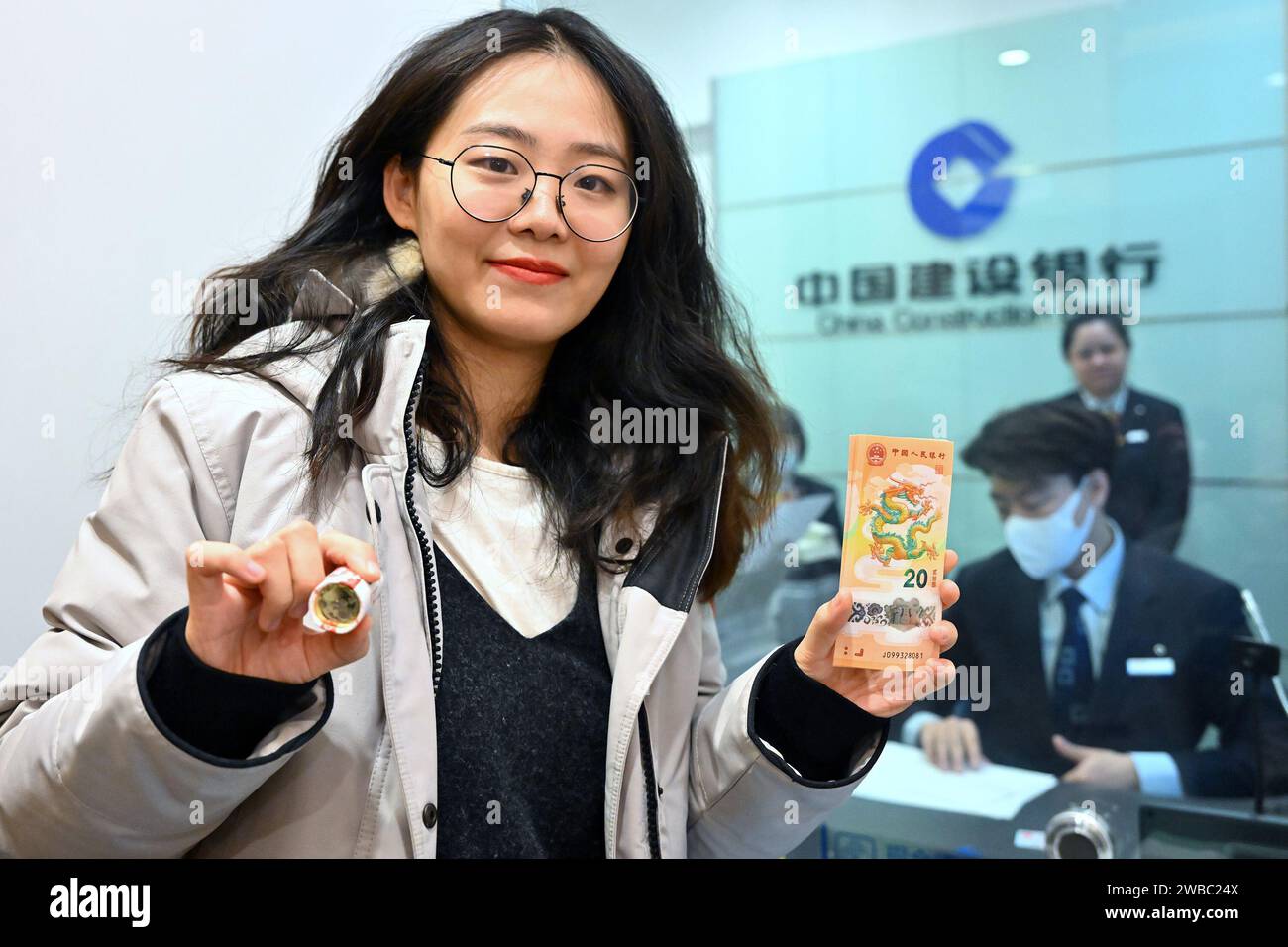 Beijing, China. 9th Jan, 2024. A citizen shows newly exchanged ...