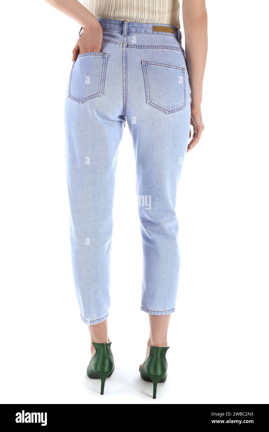 Young woman in stylish jeans on white background, back view Stock Photo ...