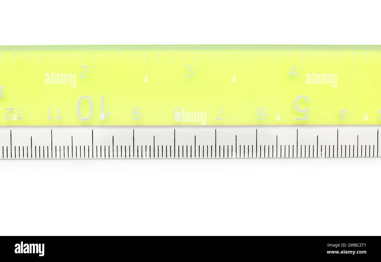 Yellow plastic ruler on white background Stock Photo - Alamy