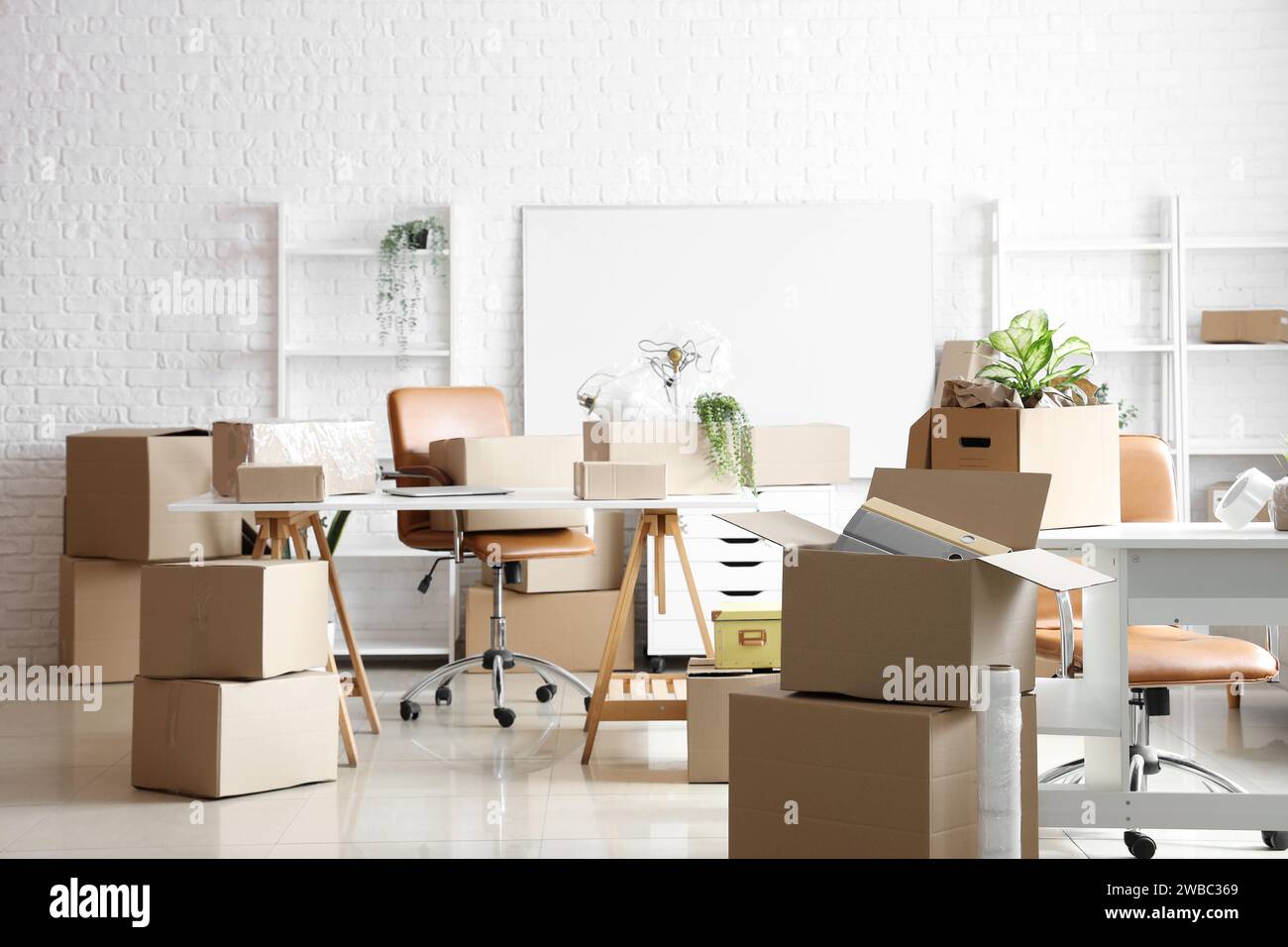 Shelving unit cardboard boxes hi-res stock photography and images - Alamy