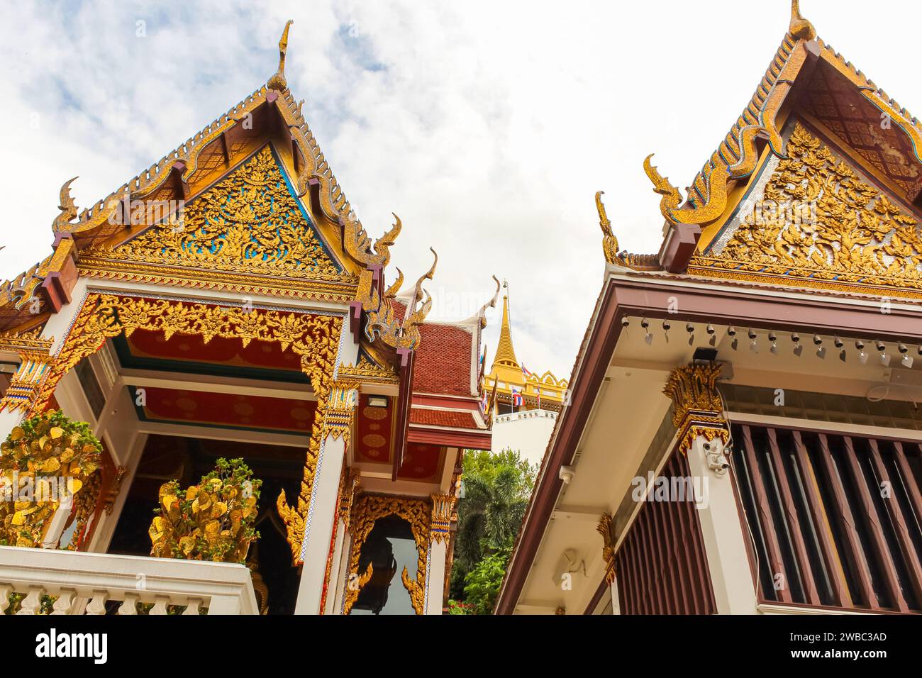 The Golden Mount at Wat Saket, Travel Landmark of Bangkok THAILAND. Blue sky with clouds with ...