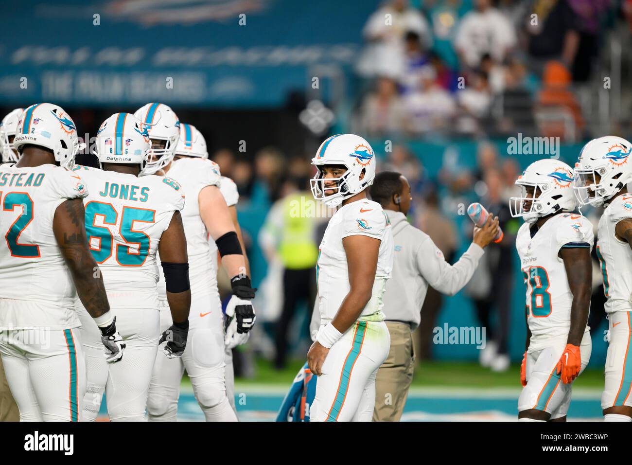 Miami Dolphins quarterback Tua Tagovailoa (1) looks toward the bench as ...