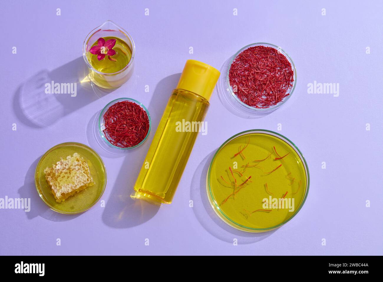 Concept for cosmetic advertisement with saffron extract and honey. On a ...