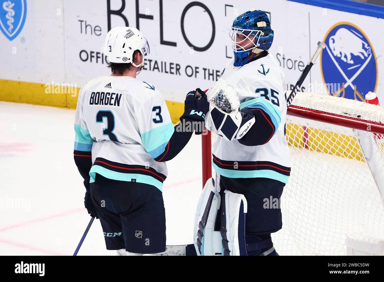 Seattle Kraken defenseman Will Borgen (3) and goaltender Joey Daccord ...