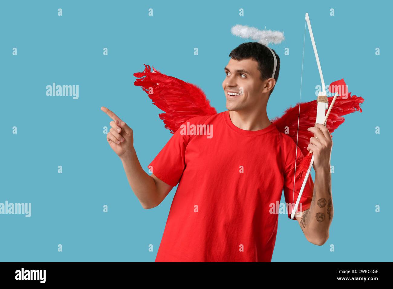 Angel pointing to heaven hi-res stock photography and images - Alamy