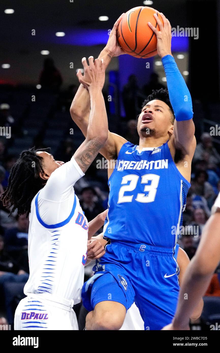 Creighton guard Trey Alexander, right, drives to the basket against ...