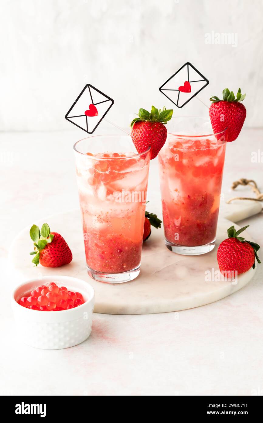 Strawberry lemonade made with fresh puree and topped with bubble pearls ...