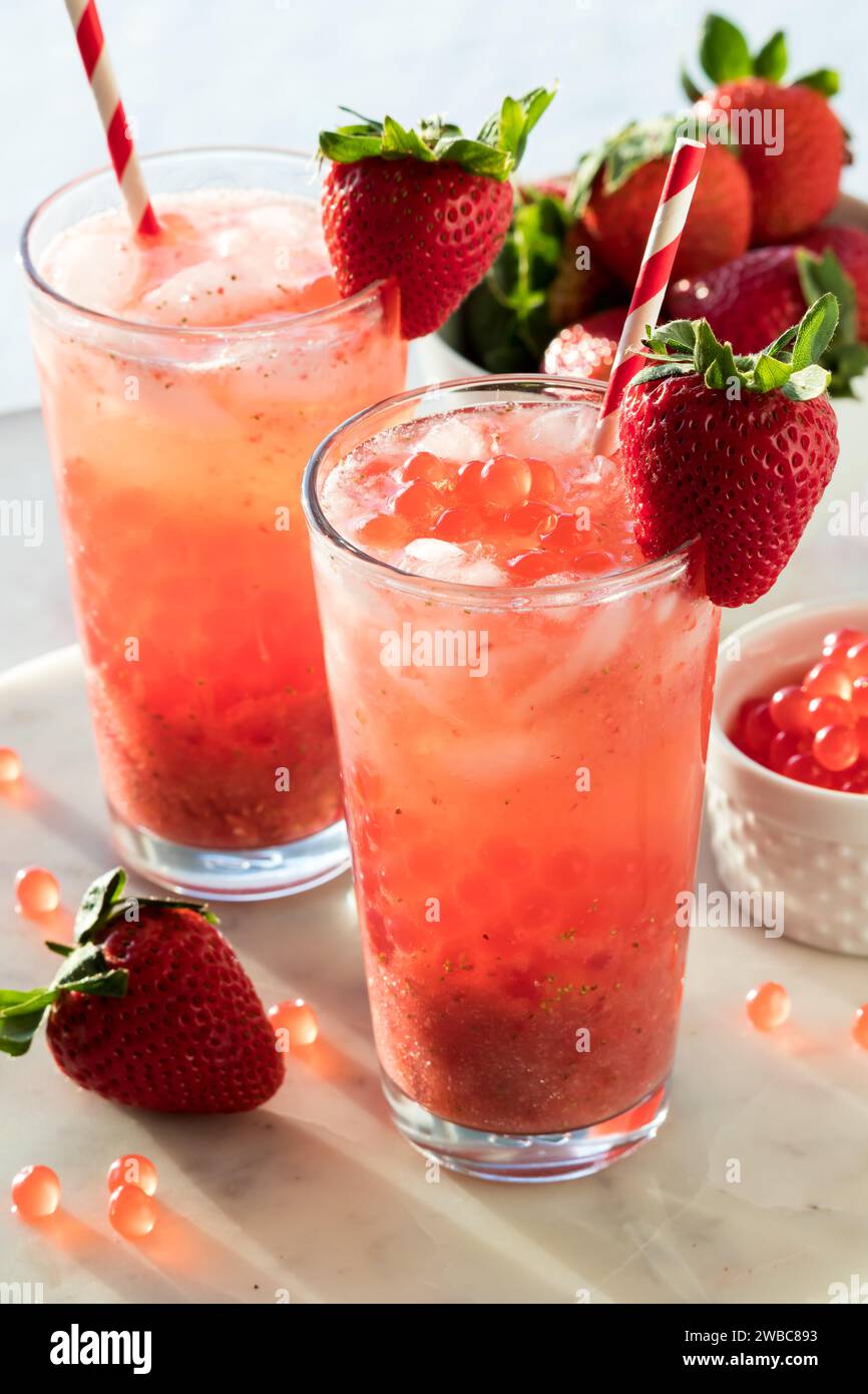 Glasses of fresh homemade strawberry lemonade with bubble pearls Stock ...