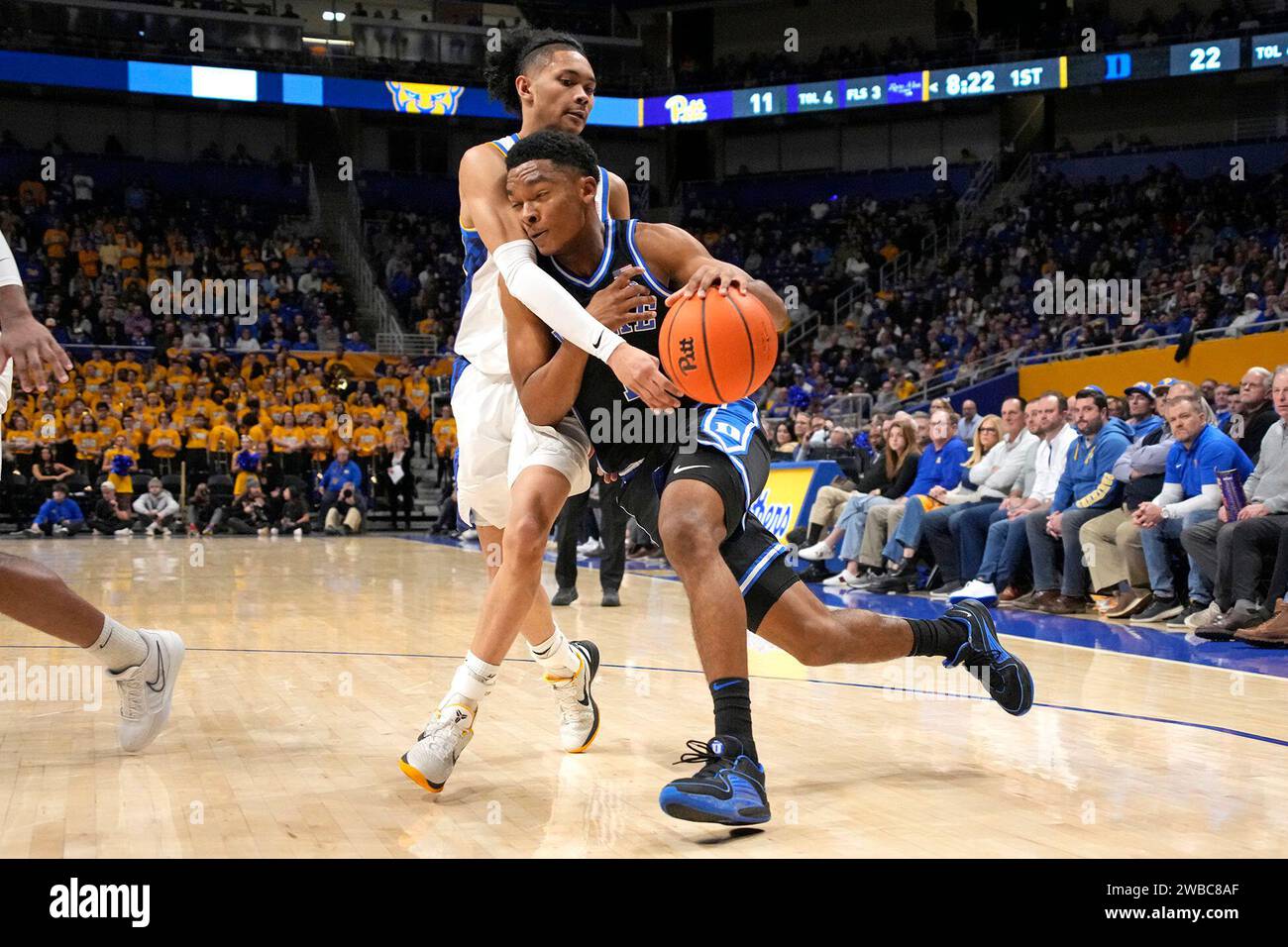Duke 's Caleb Foster, front, drives past Pittsburgh's Jaland Lowe ...