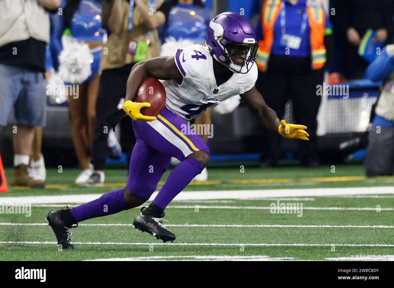 Minnesota Vikings wide receiver Brandon Powell (4) returns a punt ...