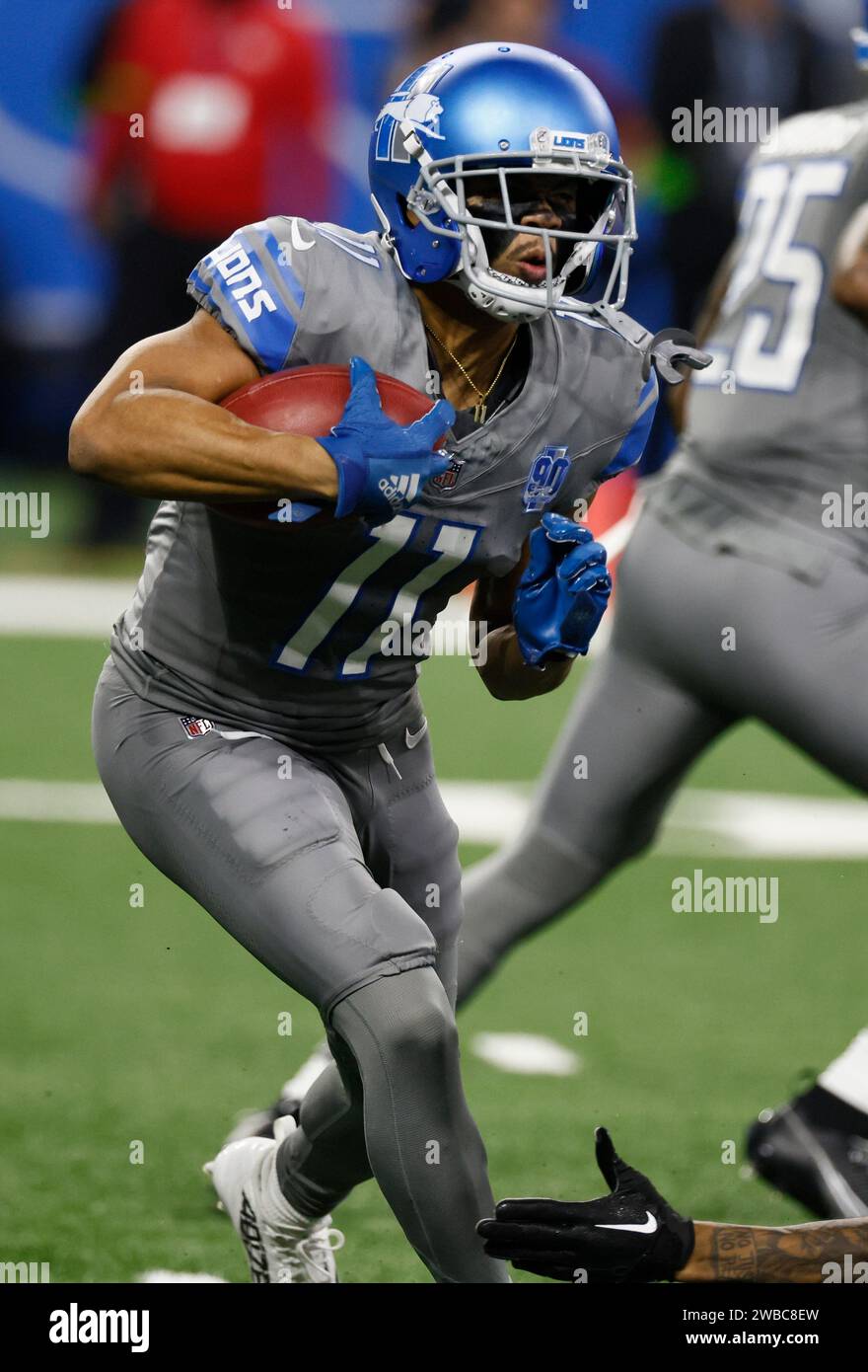 Detroit Lions wide receiver Kalif Raymond (11) caries the ball against ...