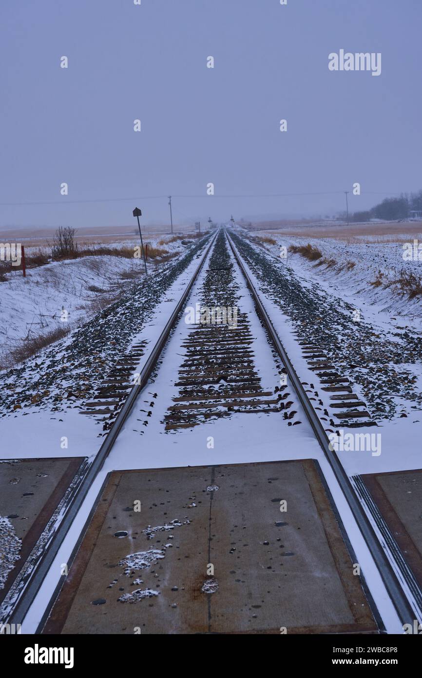A captivating winter photo session on a railroad Stock Photo - Alamy