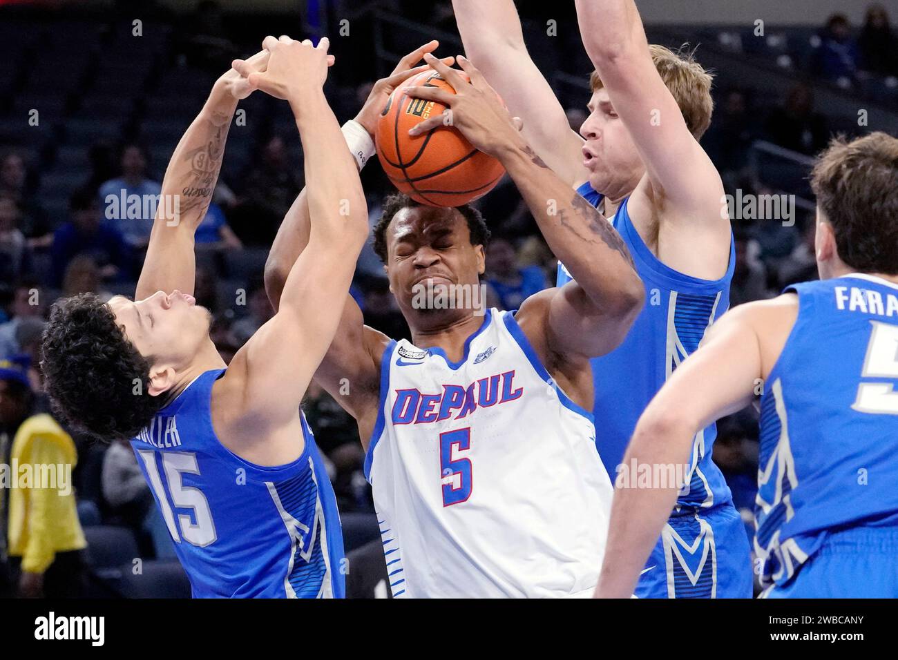 Creighton guard Josiah Dotzler, left, and forward Isaac Traudt, right ...