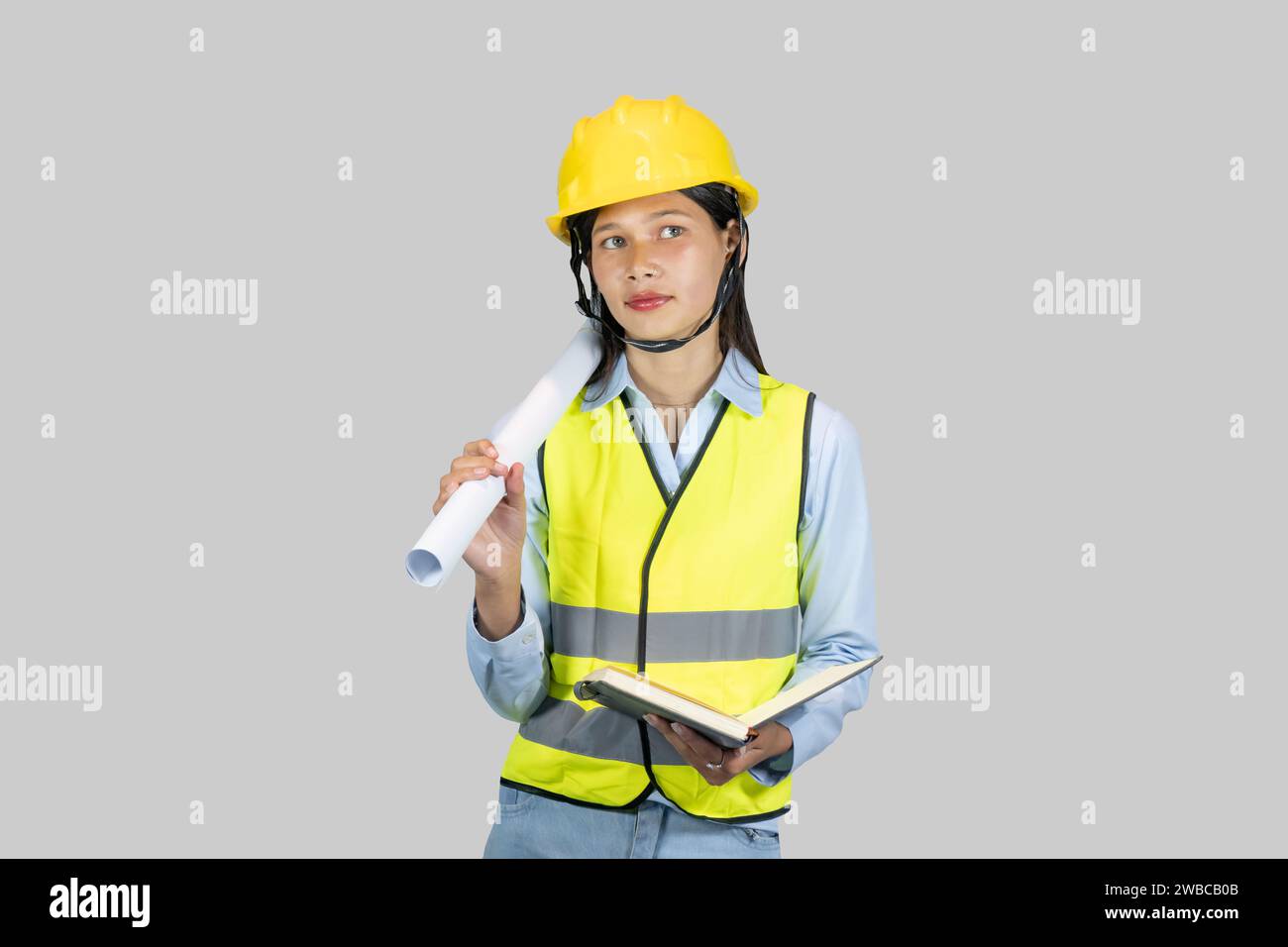 Indian Nepalese Asian Construction Engineer with chartboard and ...