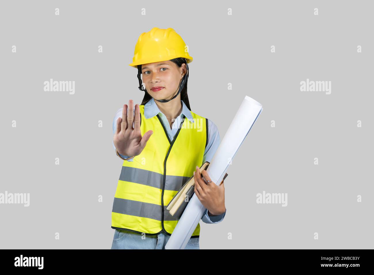 Indian Nepalese Asian Construction Engineer with chartboard and ...