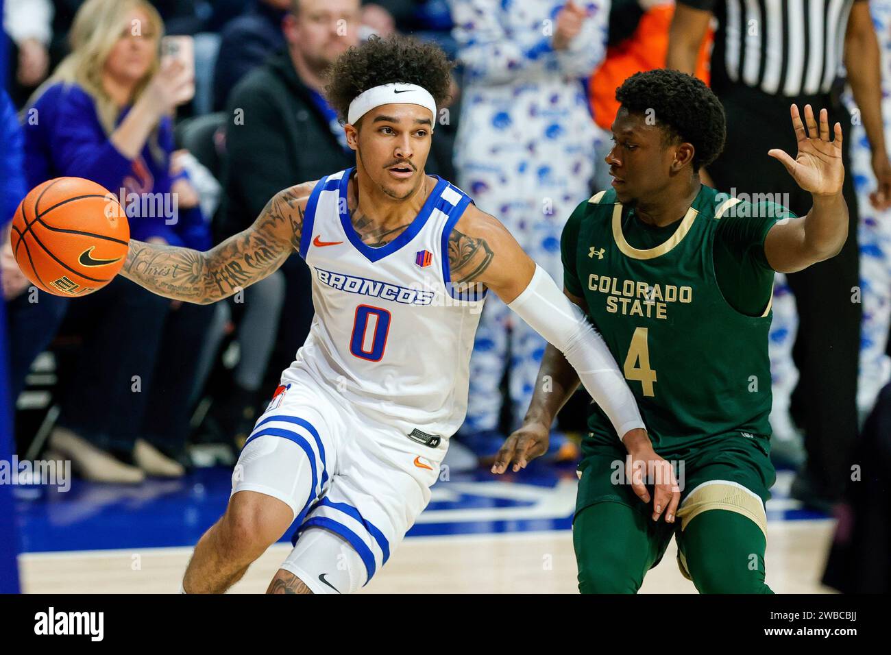 Boise State guard Roddie Anderson III (0) drives against Colorado State guard Isaiah Stevens (4 ...