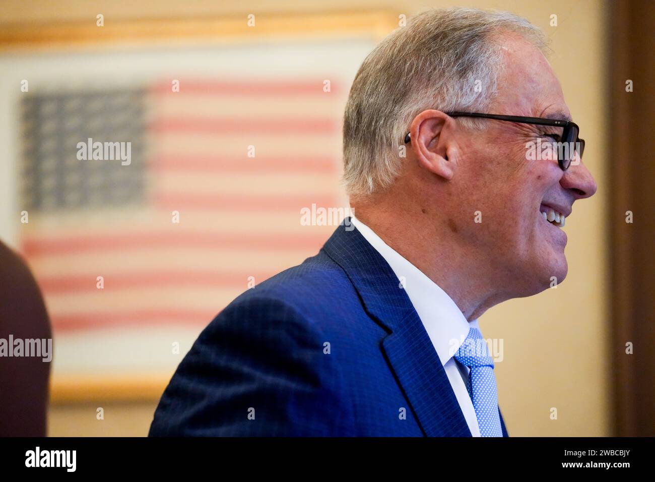Washington Gov. Jay Inslee smiles as he prepares in his office before ...