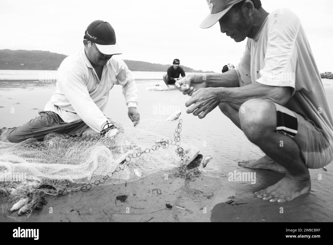 Collect sand Black and White Stock Photos & Images - Alamy