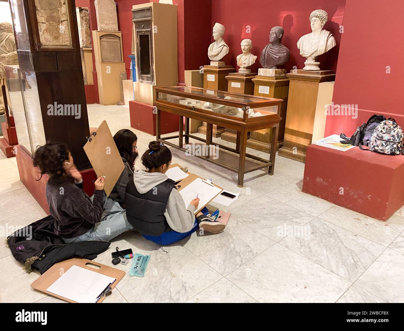 Cairo, Egypt. 08th Jan, 2022. Young artists paint portraits from ...