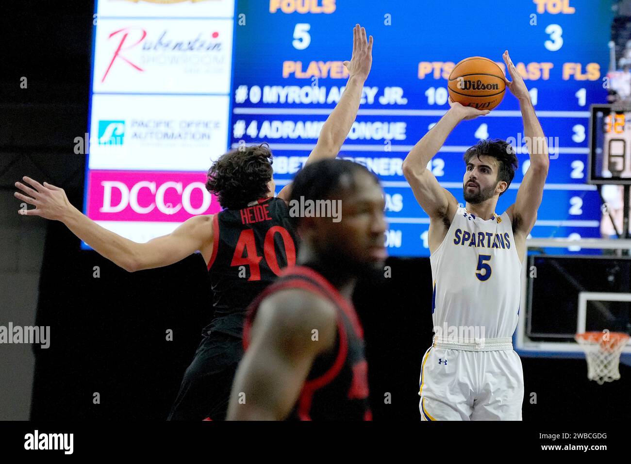 San Jose State forward Tibet Gorener (5) makes a 3-point shot over San ...