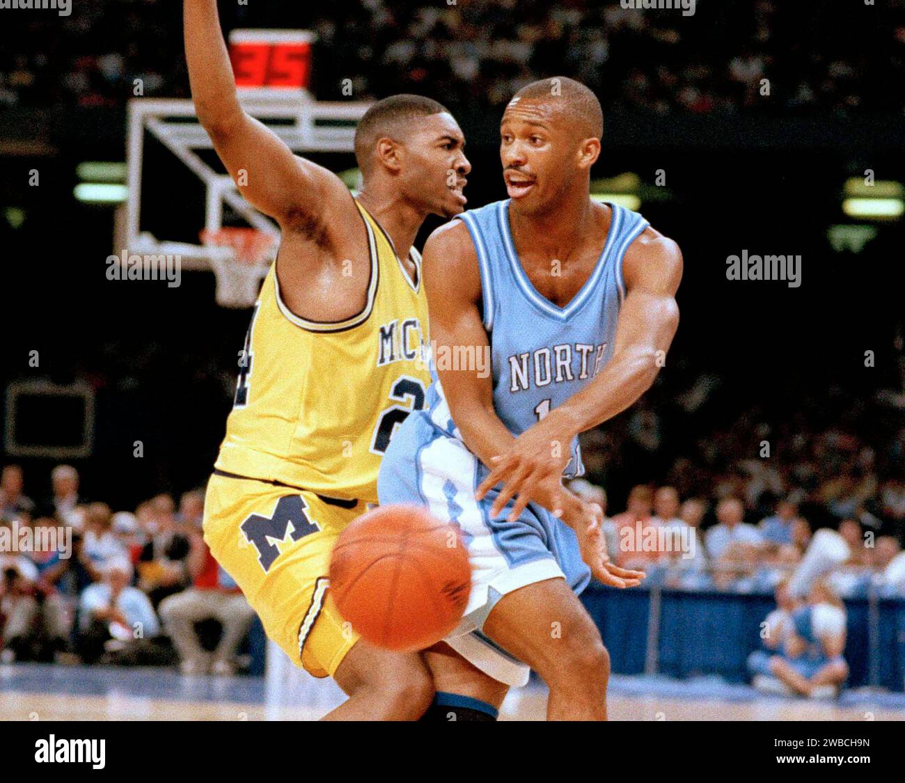 FILE - Michigan's Jimmy King, left, guards against North Carolina's ...