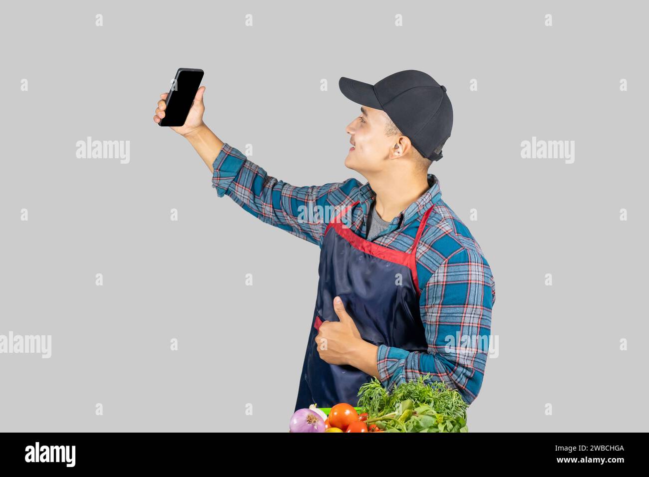 Young Entrepreneur Asian Vegetable Farmer using digital technology ...