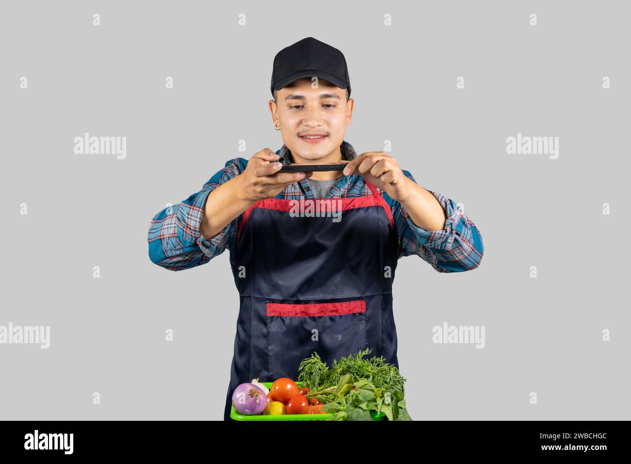 Young Entrepreneur Asian Vegetable Farmer using digital technology ...