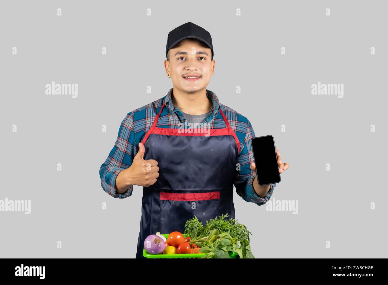 Young Entrepreneur Asian Vegetable Farmer using digital technology ...